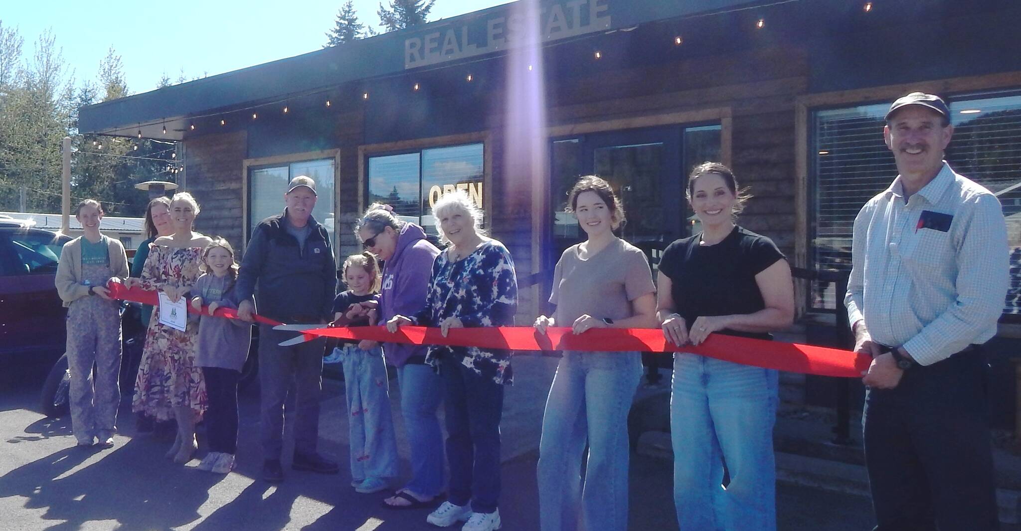 Double ribbon cutting at new Forks businesses | Forks Forum